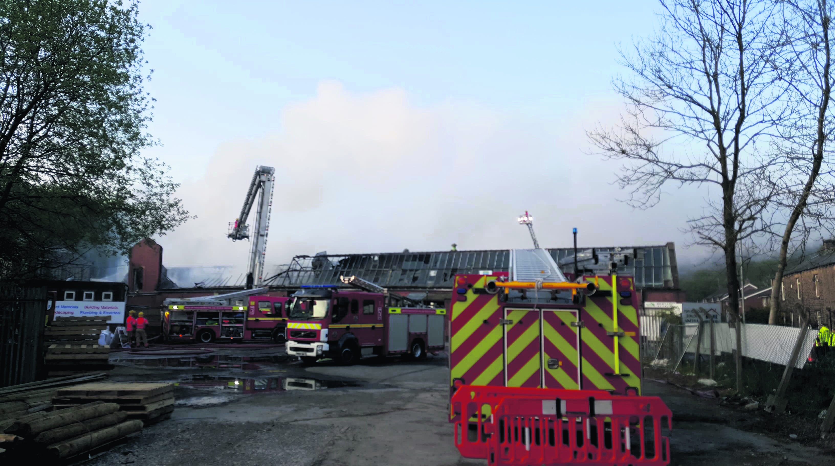 Residents evacuated as businesses count cost of Delph mill fire ...